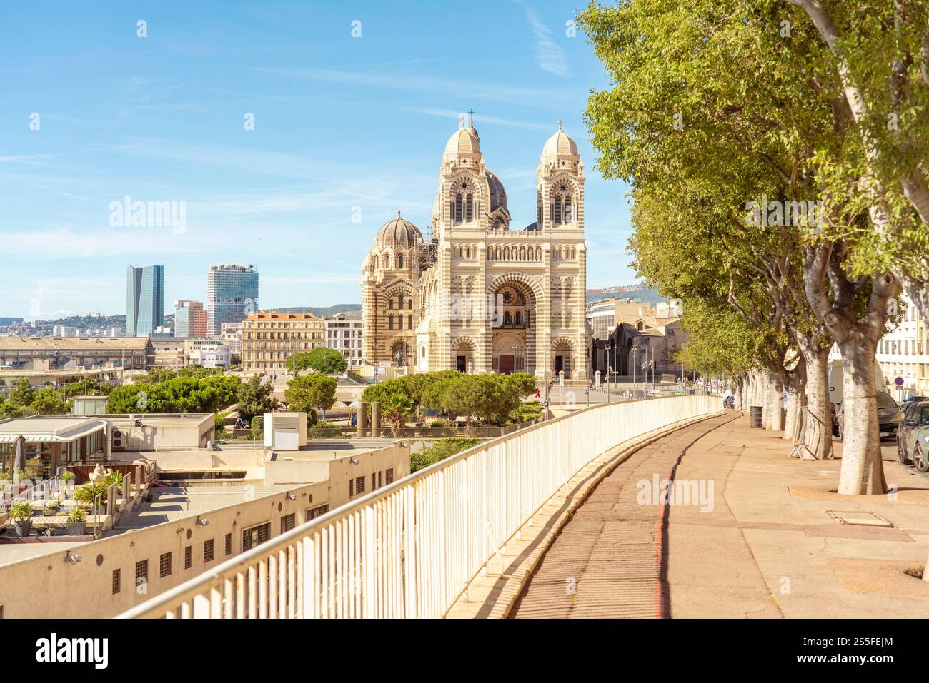 Sunny day view of a grand cathedral La Mayor in Marseille with twin ...