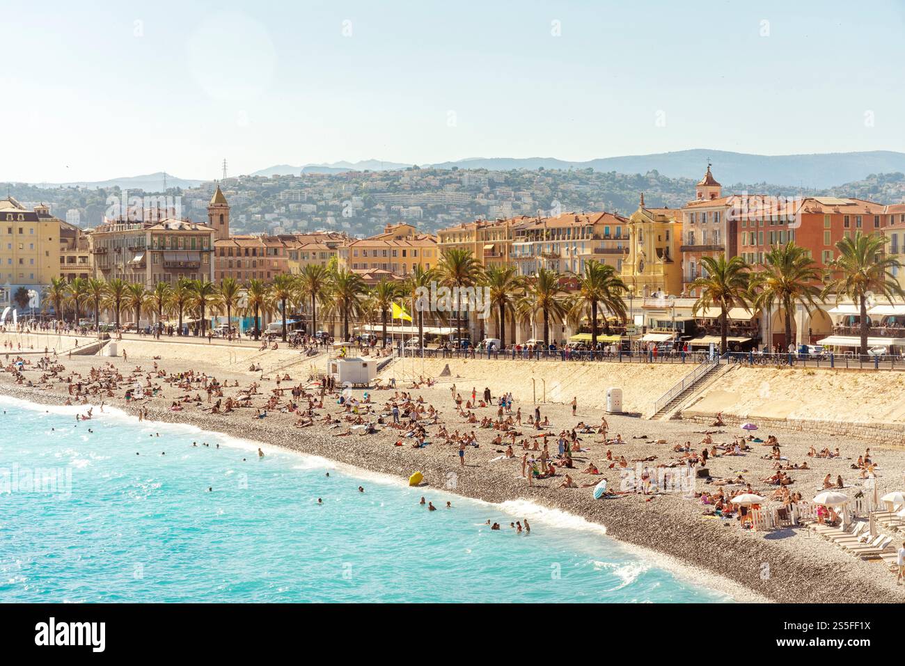 Sunny beach scene crowd people enjoying shore hi-res stock photography ...