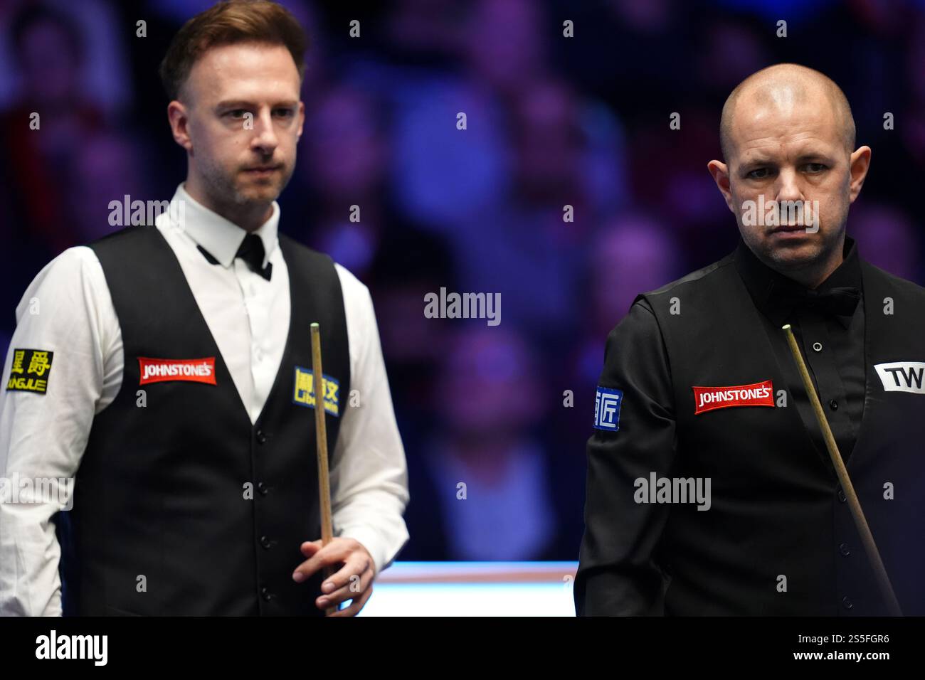 Barry Hawkins (right) during his last-16 match against Judd Trump ...