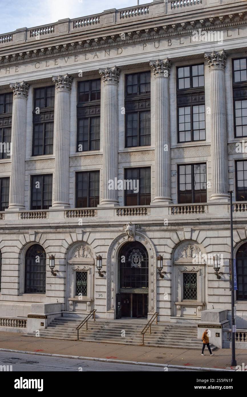 Pedestrian walks past cleveland public library hi-res stock photography ...