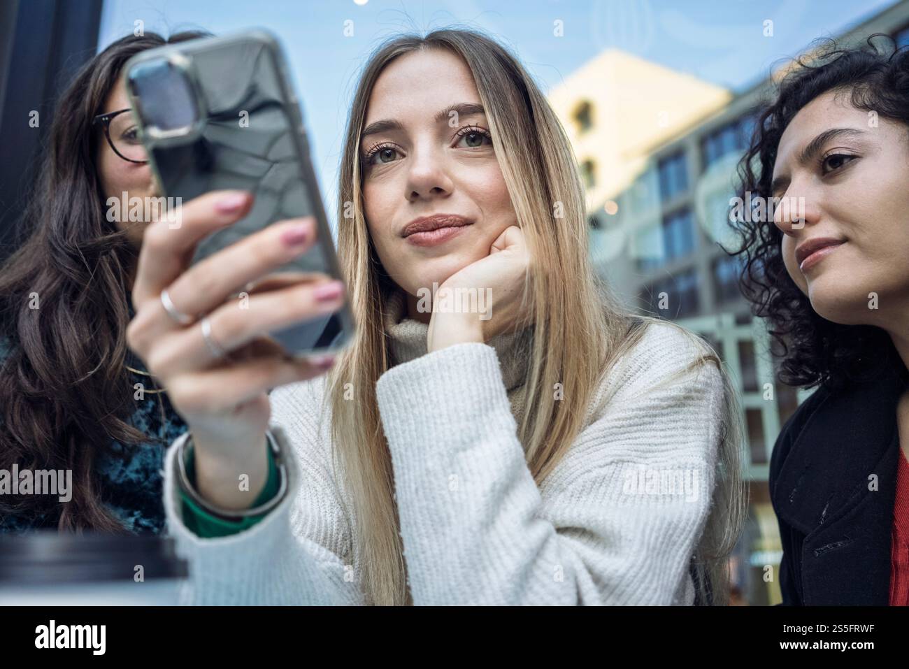Smiling engaged what y see screen hi-res stock photography and images ...