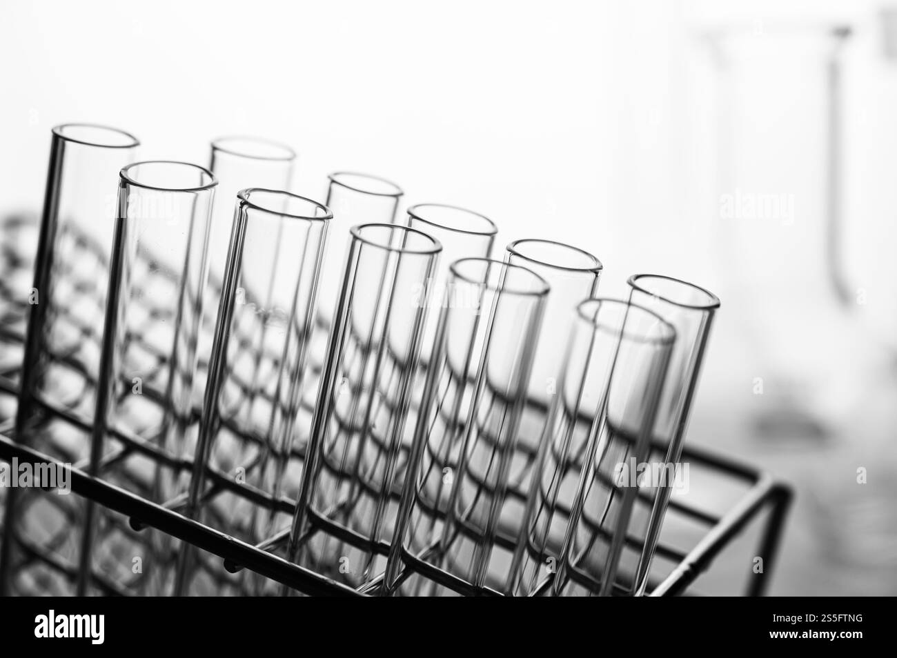 Science tubes arranged on the shelf Stock Photo - Alamy