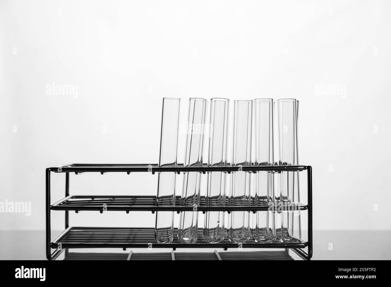 Science tubes arranged on the shelf Stock Photo - Alamy