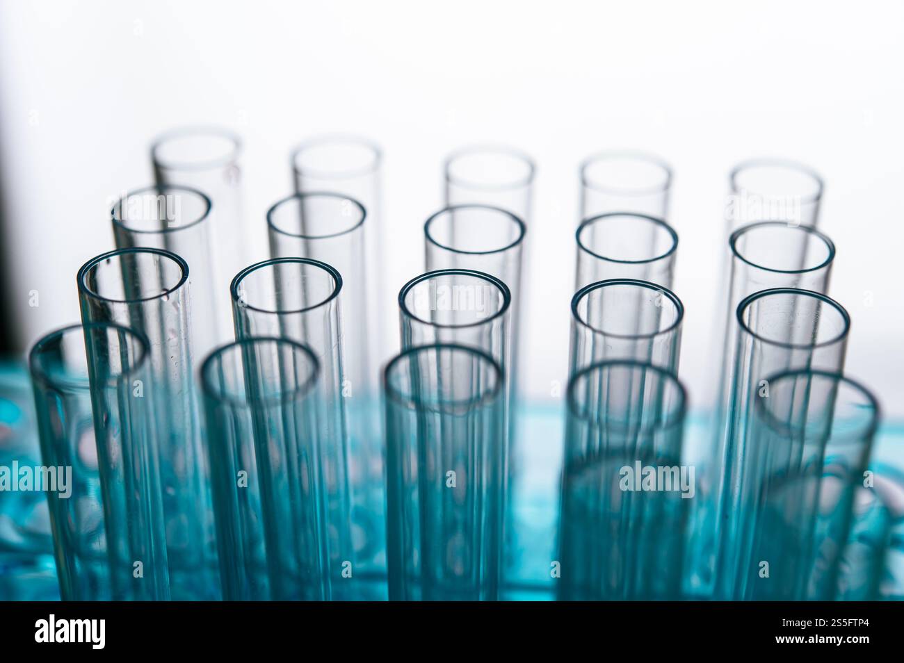 Science tubes arranged on the shelf Stock Photo - Alamy