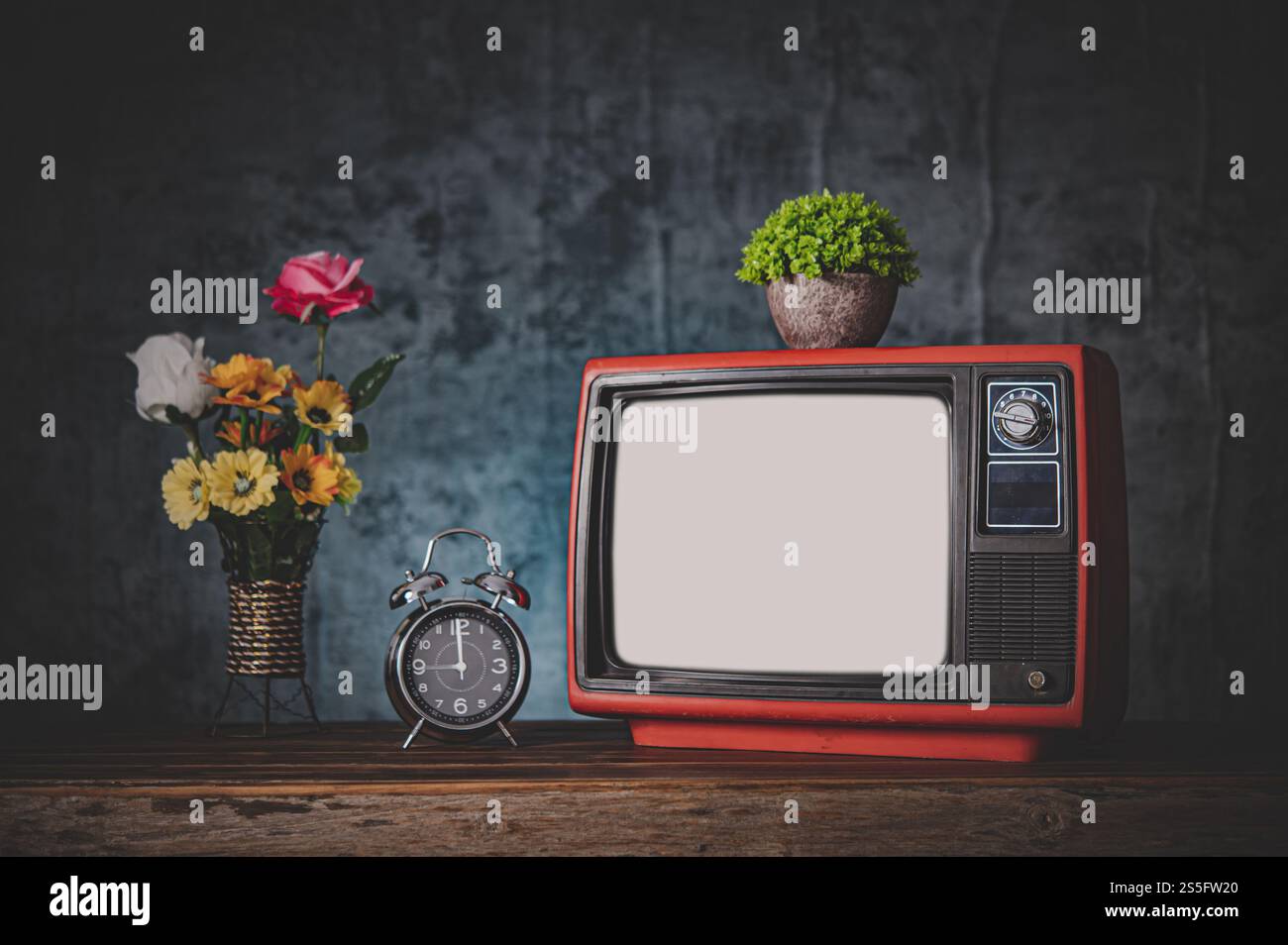Old retro TV are still life with clocks and flower vases Stock Photo ...