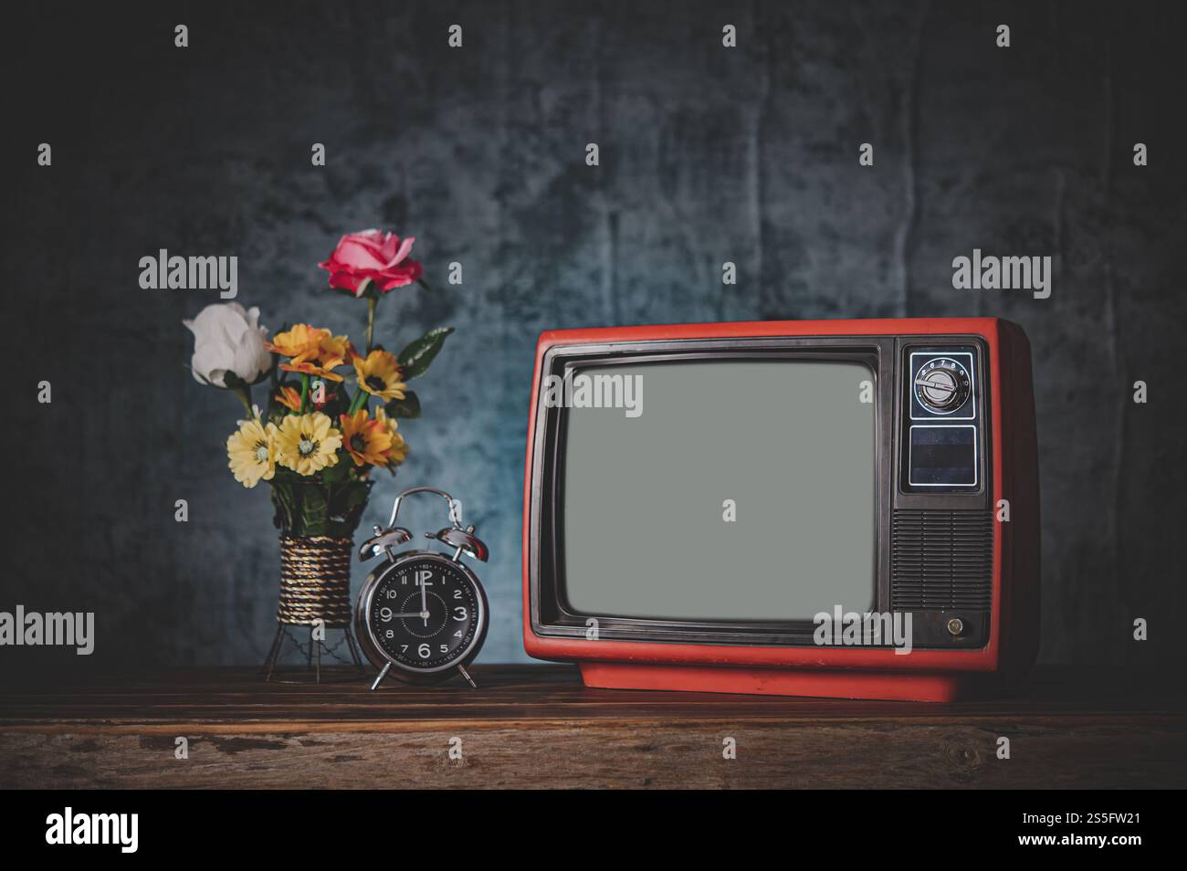 Old retro TV are still life with clocks and flower vases Stock Photo ...