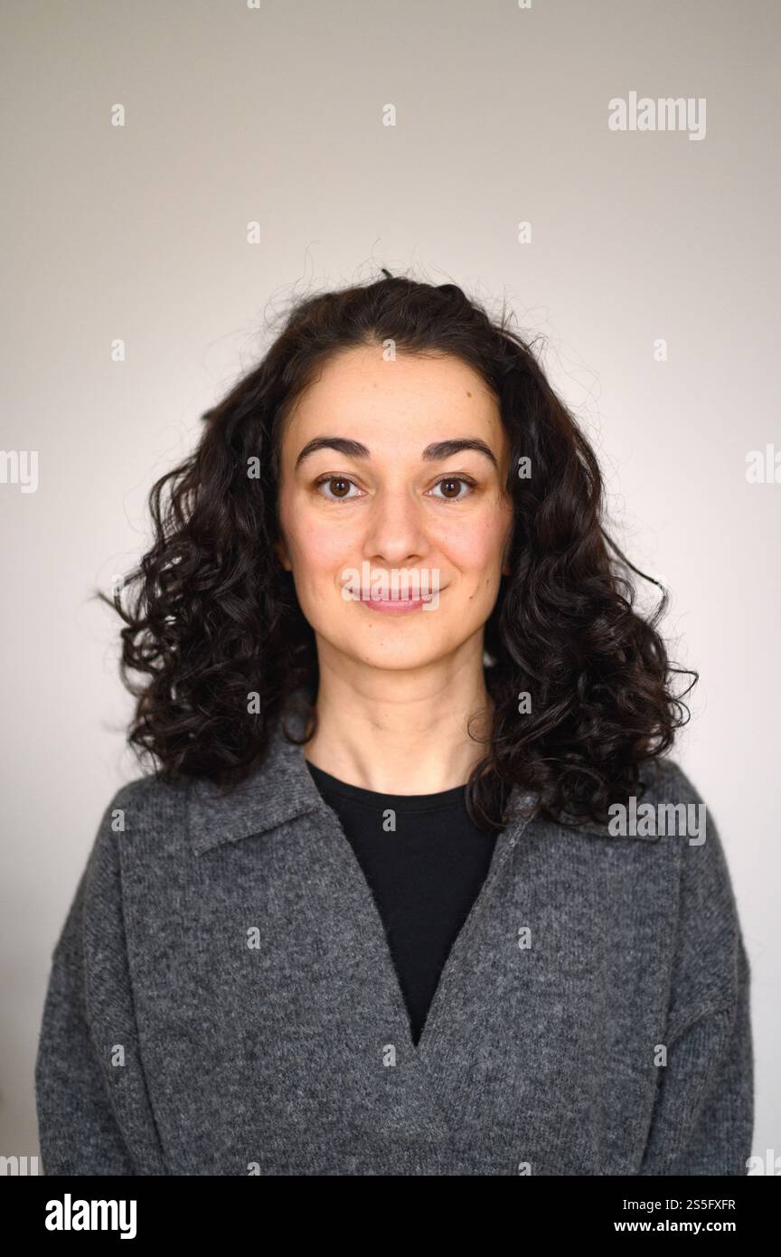 An isolated woman's portrait looking straight forward and smiling Stock ...