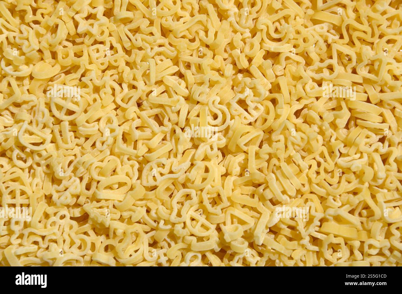 Uncooked bright yellow spaghetti hi-res stock photography and images ...