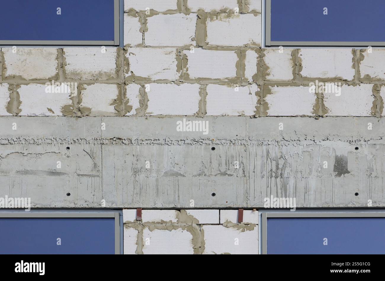 Fragment of an unfinished structure of a multi-storey building made of ...