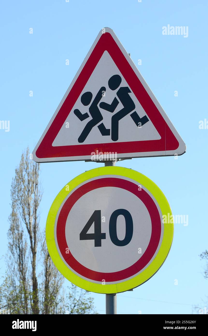 Road sign with the number 40 and the image of the children who run ...