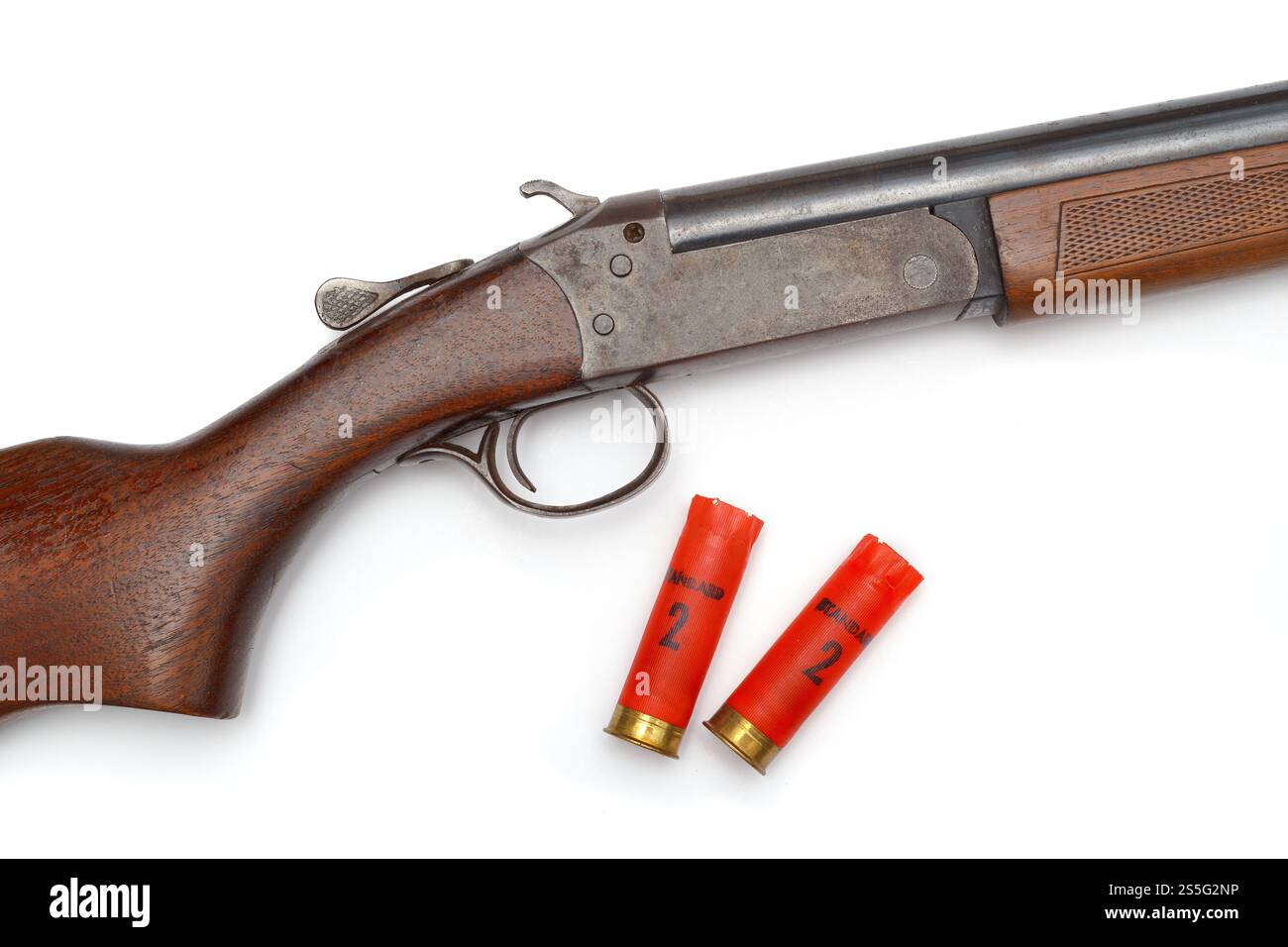 Shotgun and empty shells or cartridges on white Stock Photo - Alamy