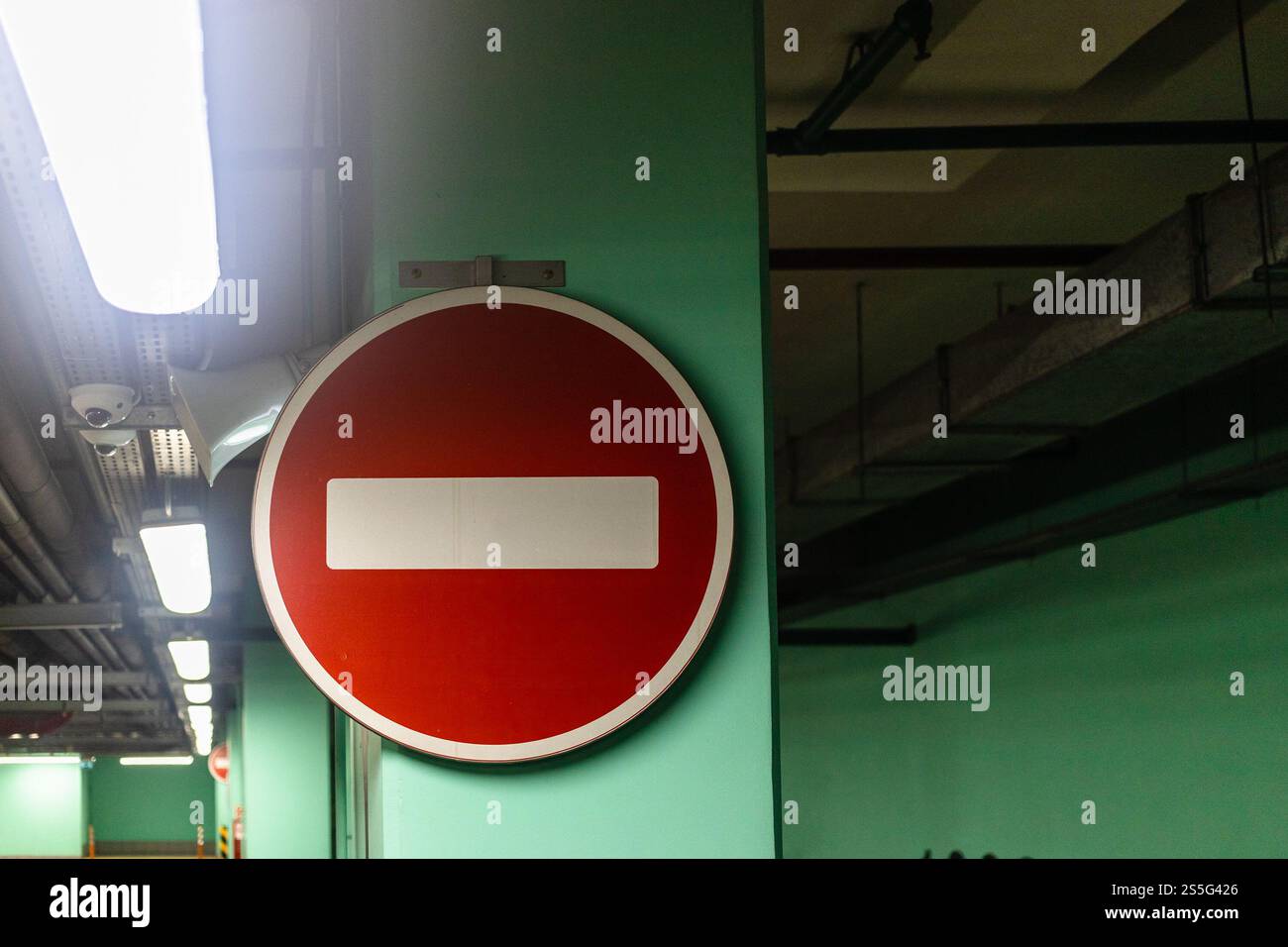 Prohibitory traffic sign in underground parking area Stock Photo - Alamy