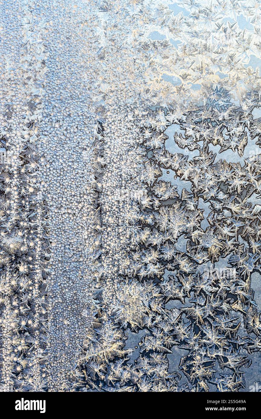 vertical natural background - frozen surface on home window glass ...