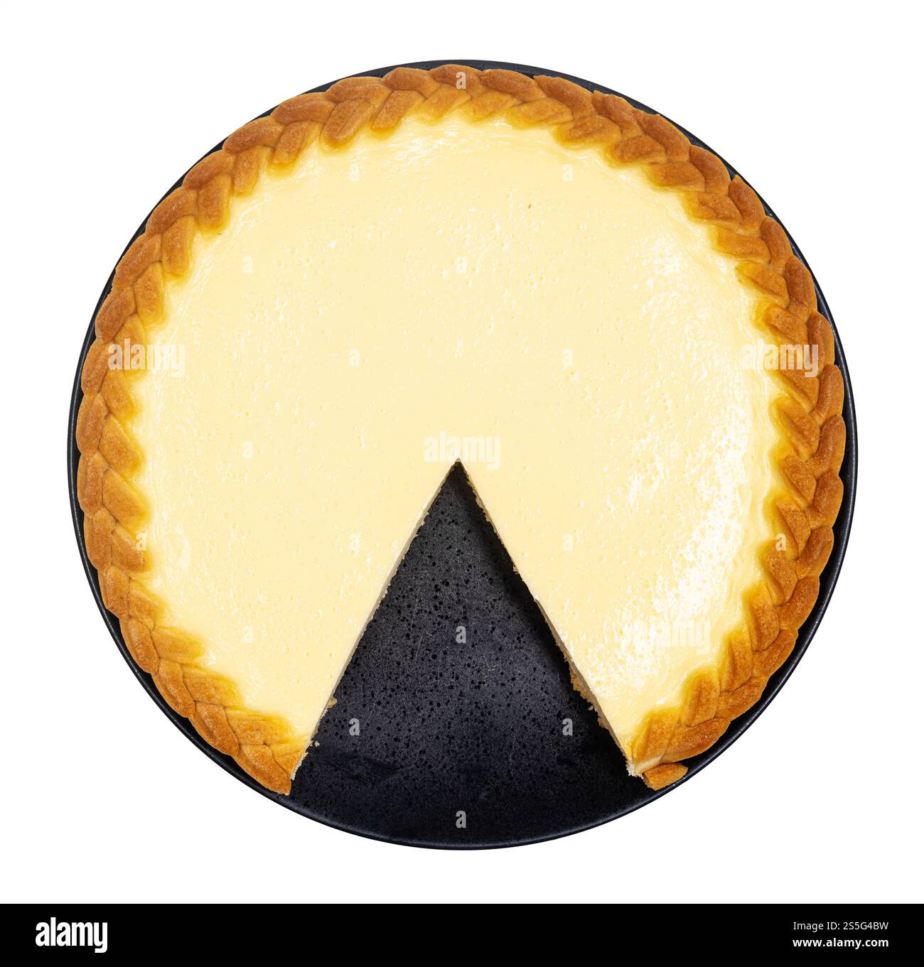 above view of cut cheesecake (sour cream cake) on black plate isolated ...