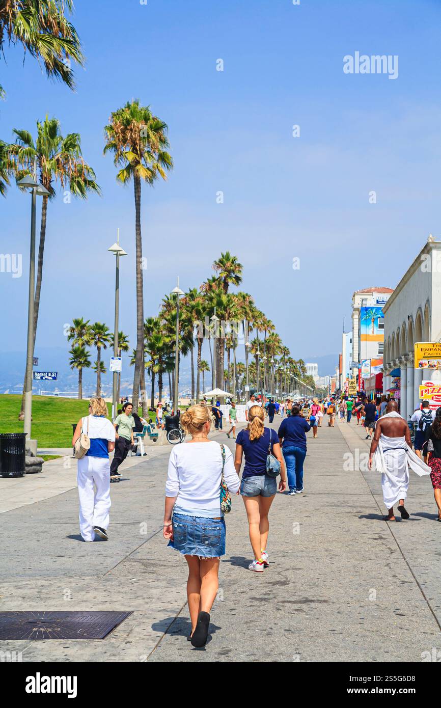The popular palm tree lined boardwalk seafront promenade at Venice ...