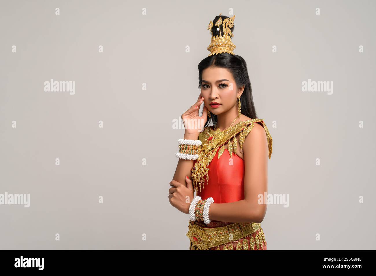 Beautiful Thai woman wearing Thai dress and looking to the side Stock ...