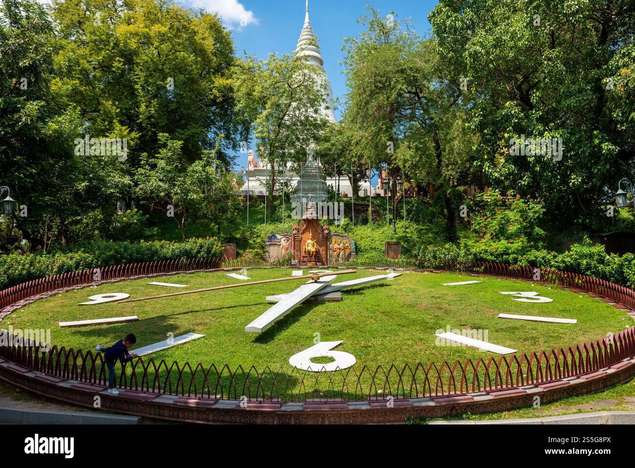 Lawn clock at at Wat Phnom, Phnom Penh, Cambodia, Asia Stock Photo - Alamy
