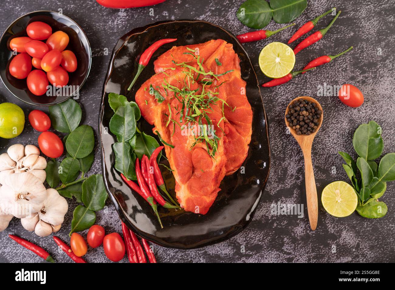 Marinated pork used in cooking, complete with chili peppers Kaffir lime ...