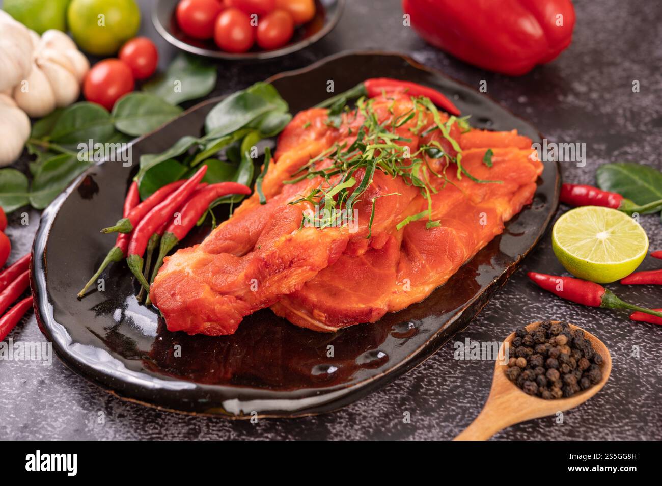 Marinated pork used in cooking, complete with chili peppers Kaffir lime ...