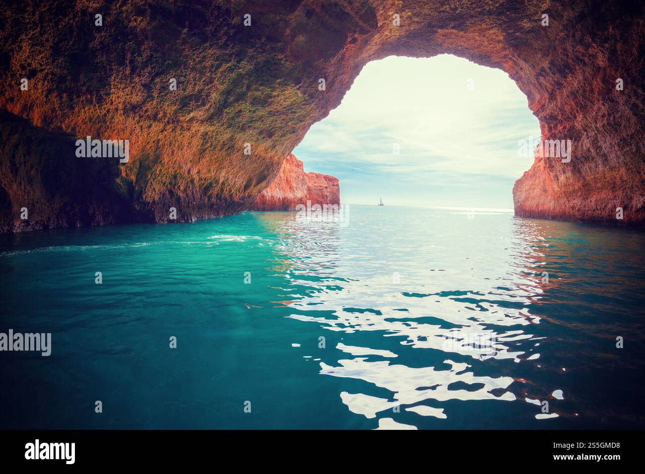 Coastal rocky seascape. Entrance in Benagil cave in Algarve region ...
