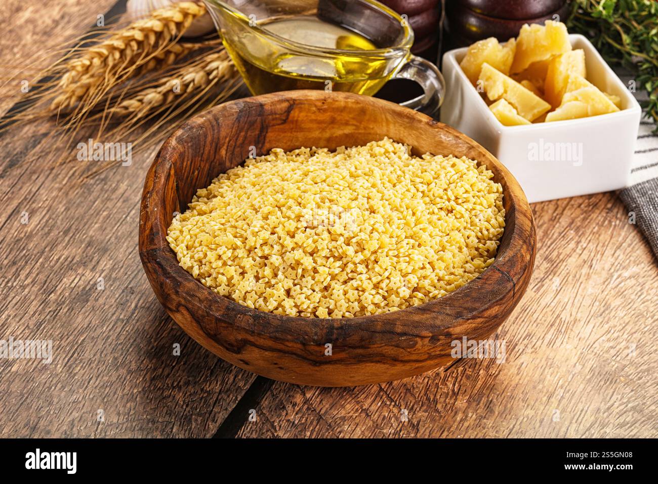 Italian cuisine - dry stelline pasta for bowl Stock Photo - Alamy