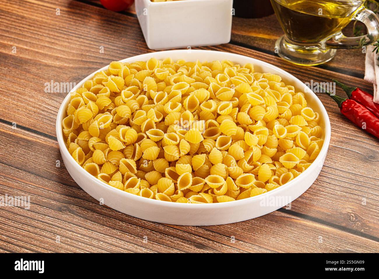 Italian cuisine - dry conchiglie shell pasta Stock Photo - Alamy