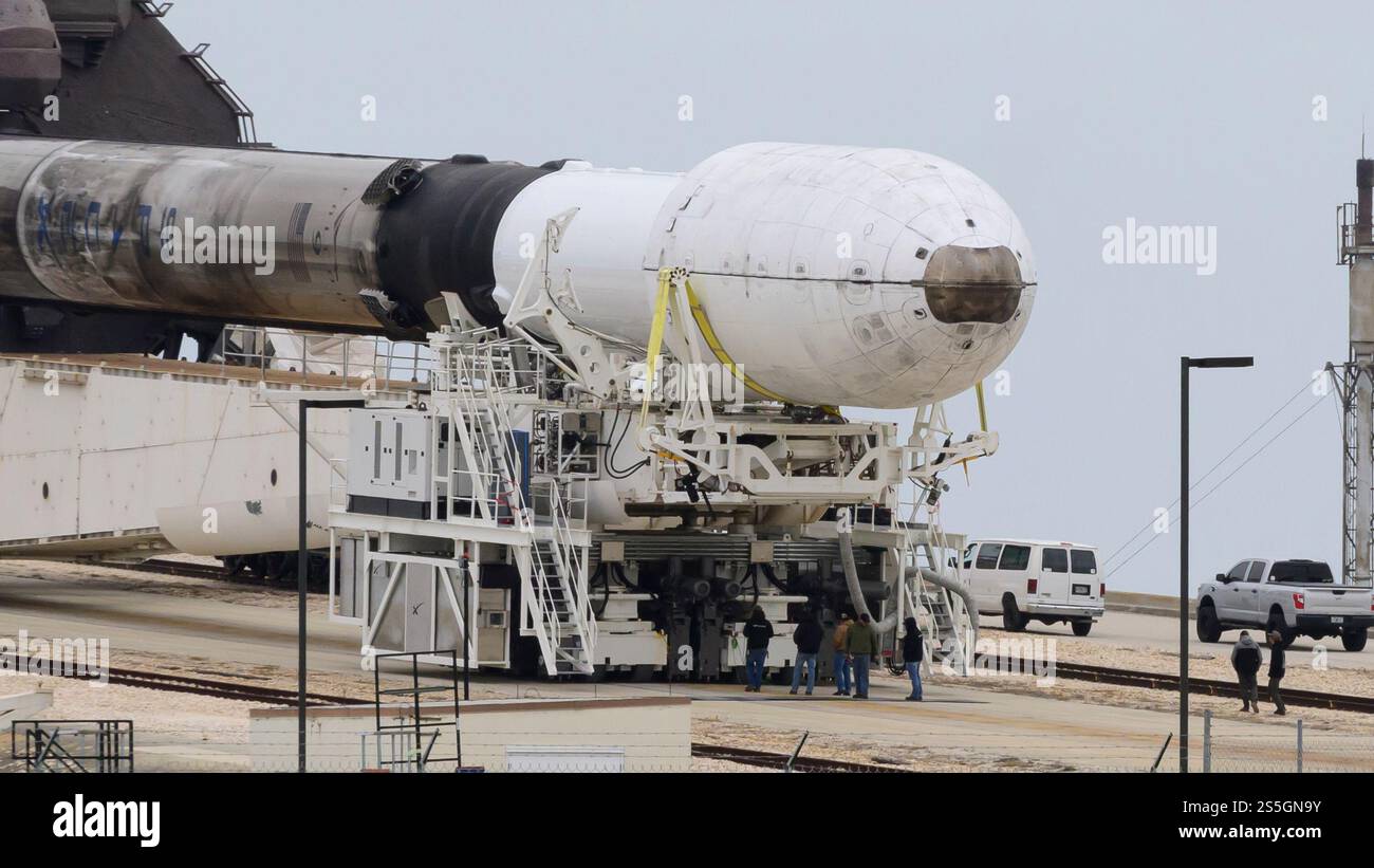 Merritt Island, Florida, USA. 14th Jan, 2025. A SpaceX Falcon 9 rocket is seen rolling out from ...