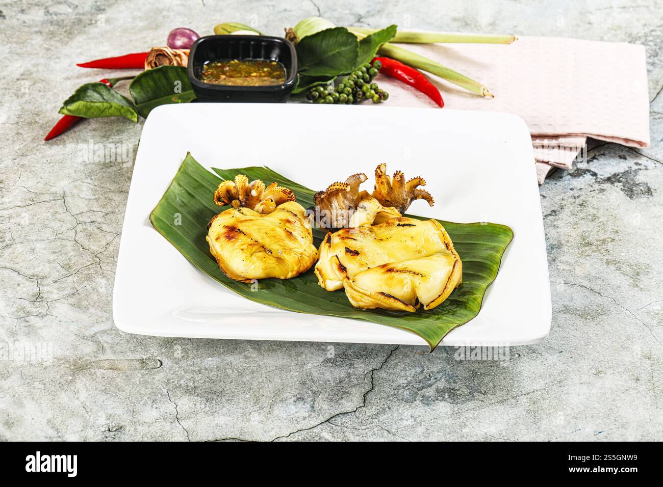 Delicous Grilled cuttlefish with sauce asian style Stock Photo - Alamy