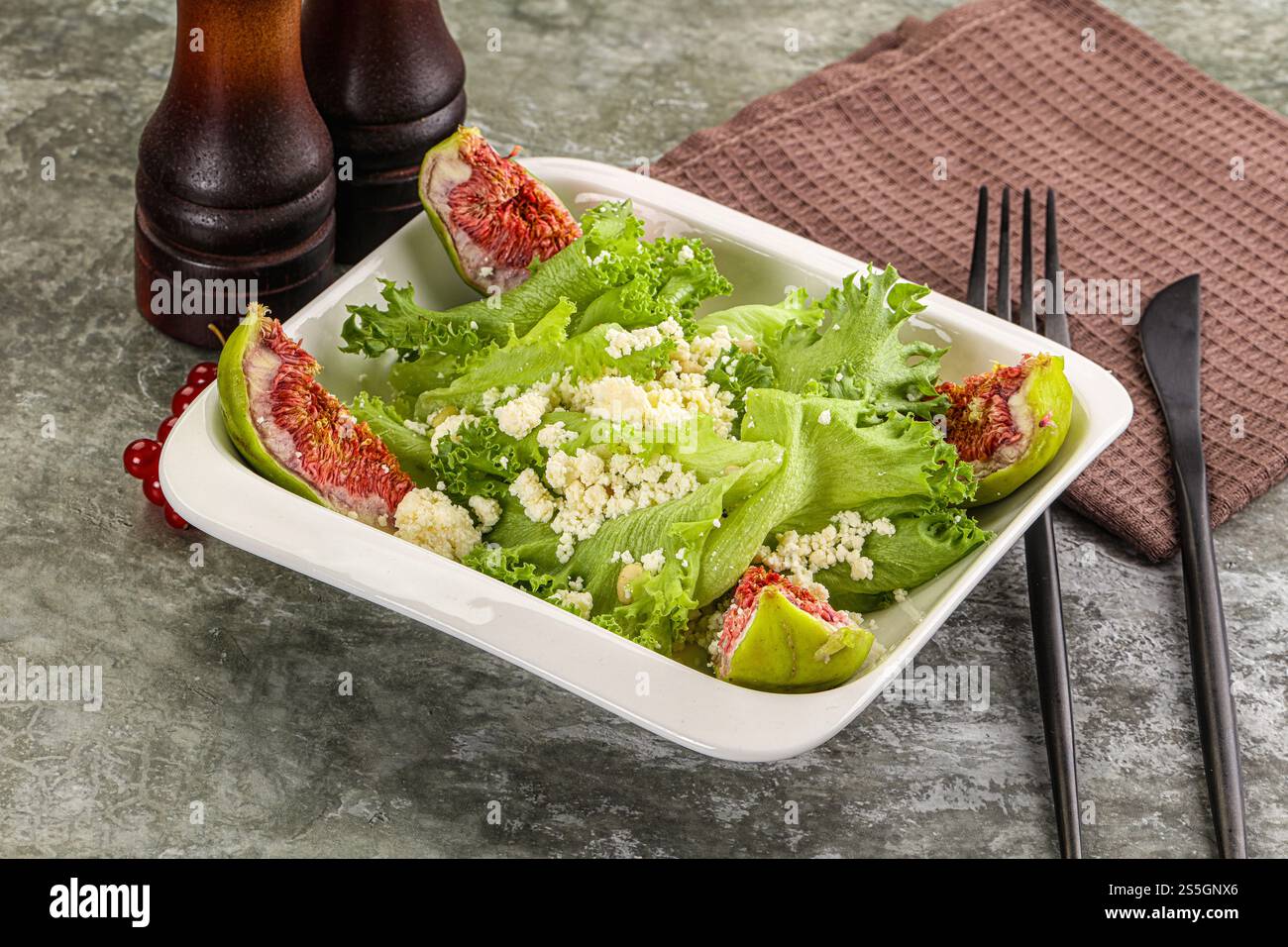 Salad with fig and sheep cottage cheese Stock Photo - Alamy