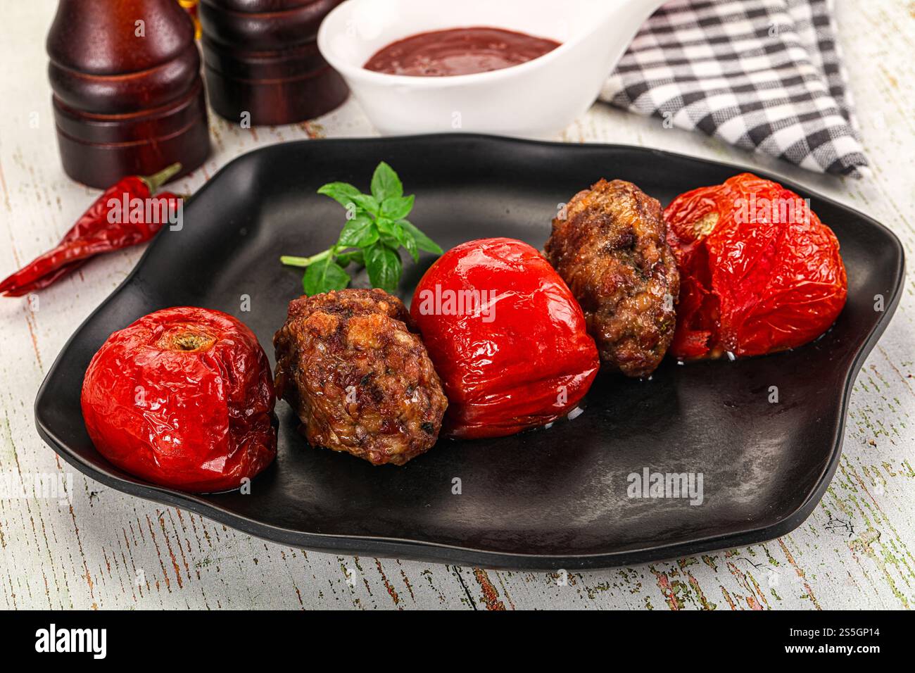 Turkish cuisine - Domatesli Kebab with minced meat and tomato Stock ...