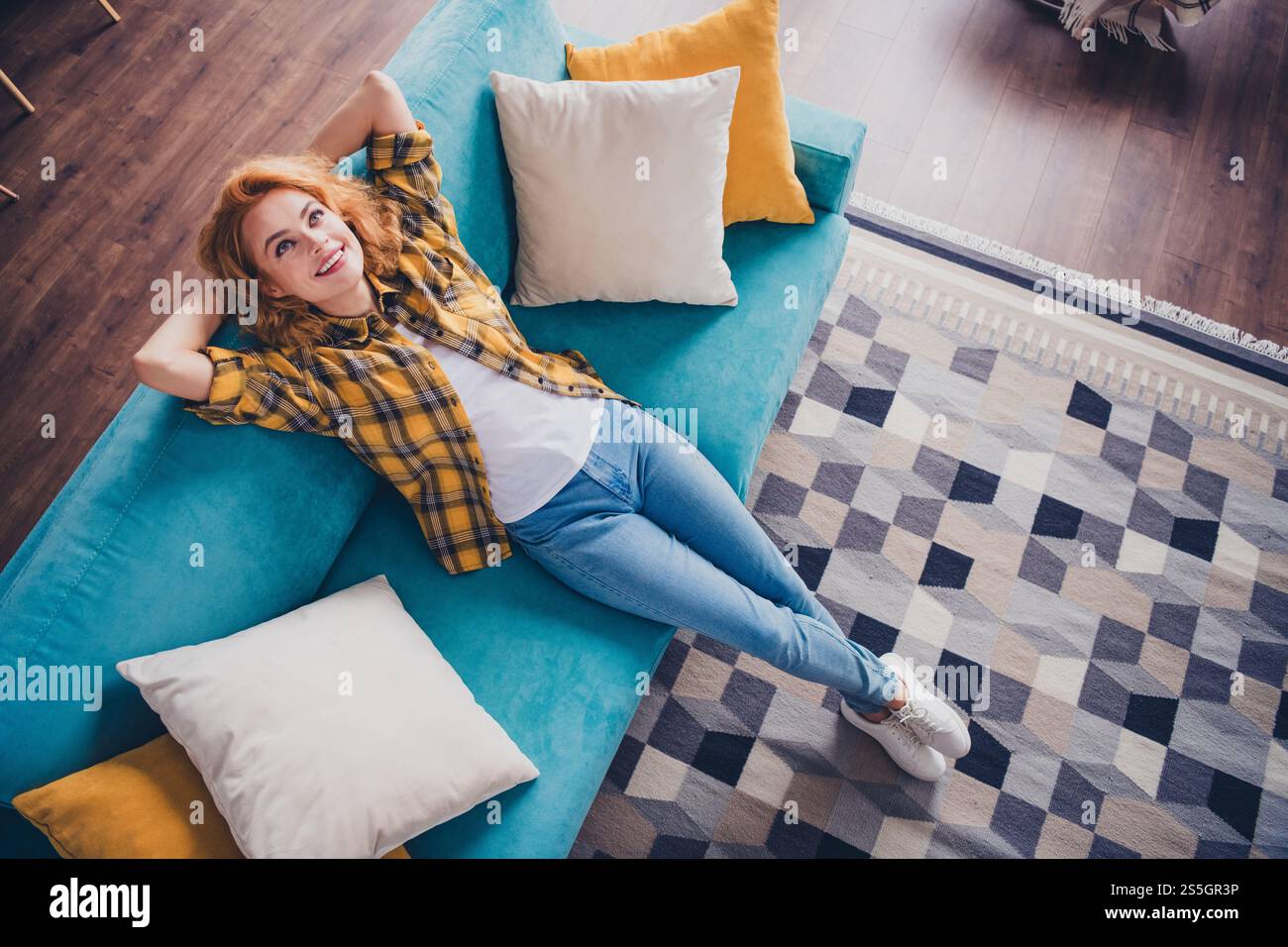 Full body photo of nice young blonde girl sit couch relax sleepy wear ...