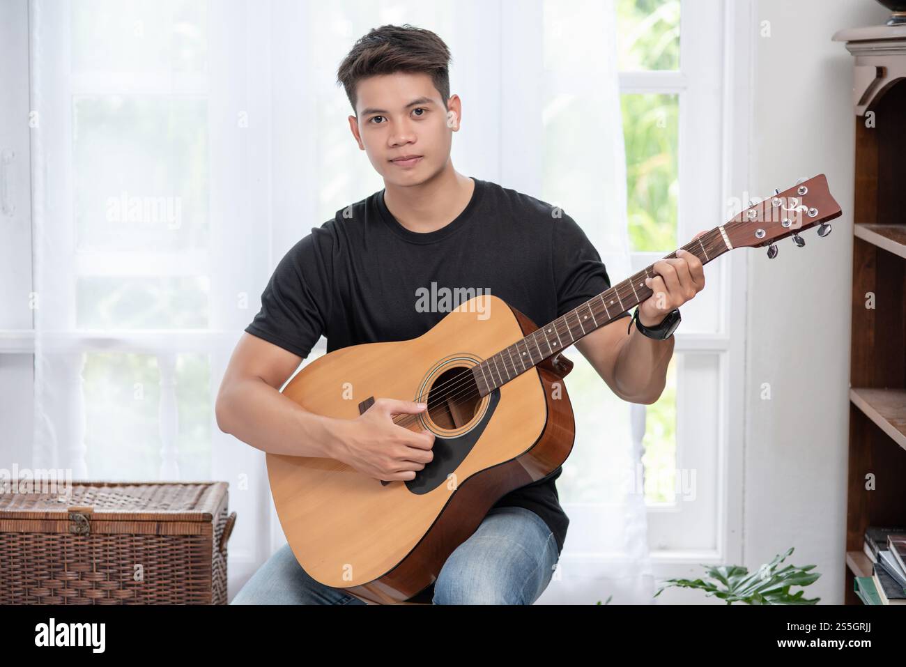 Male musician playing guitar solo hi-res stock photography and images ...