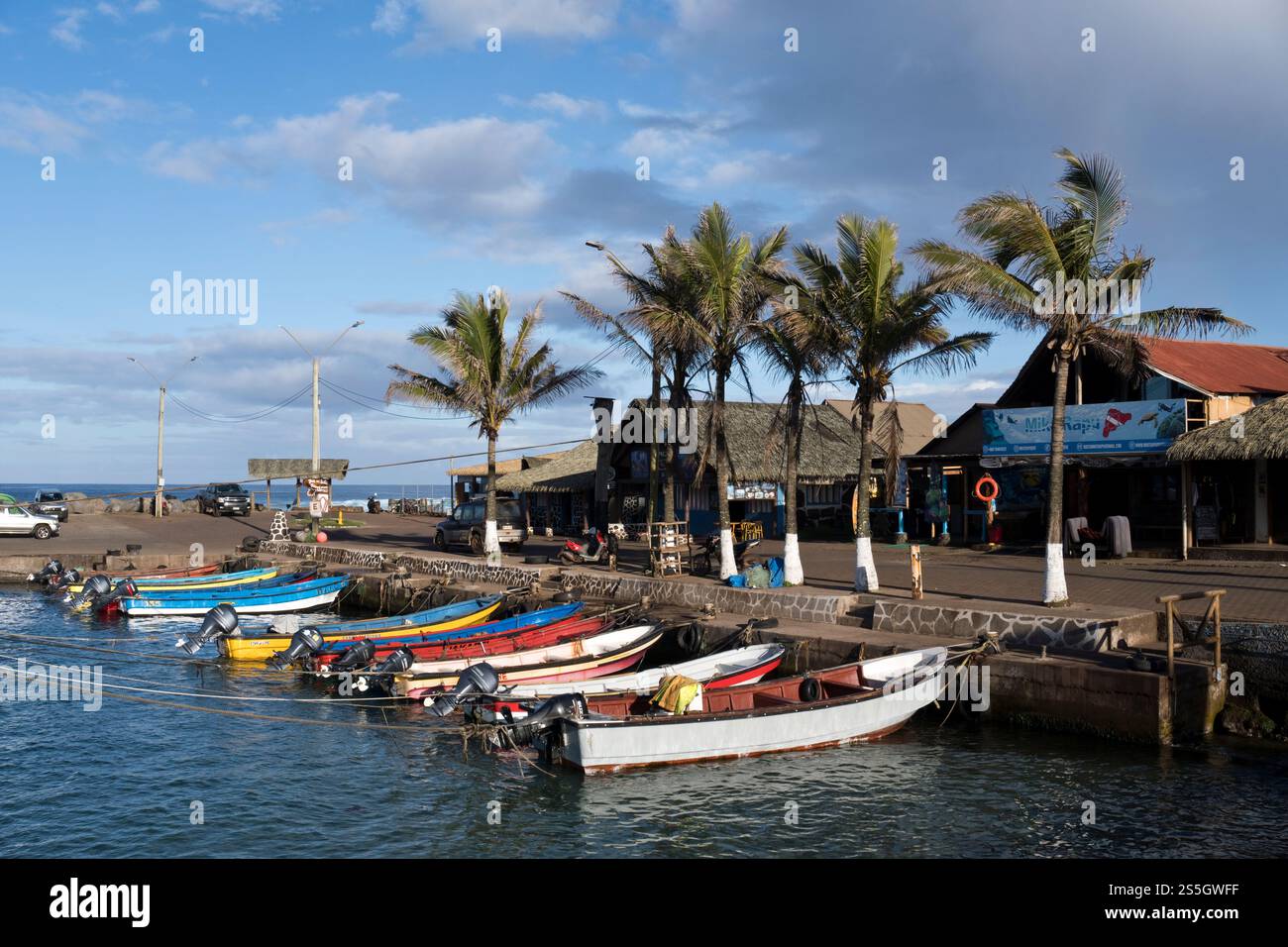 Fishing boats moored in the small port in the town of Hanga Roa, Easter ...