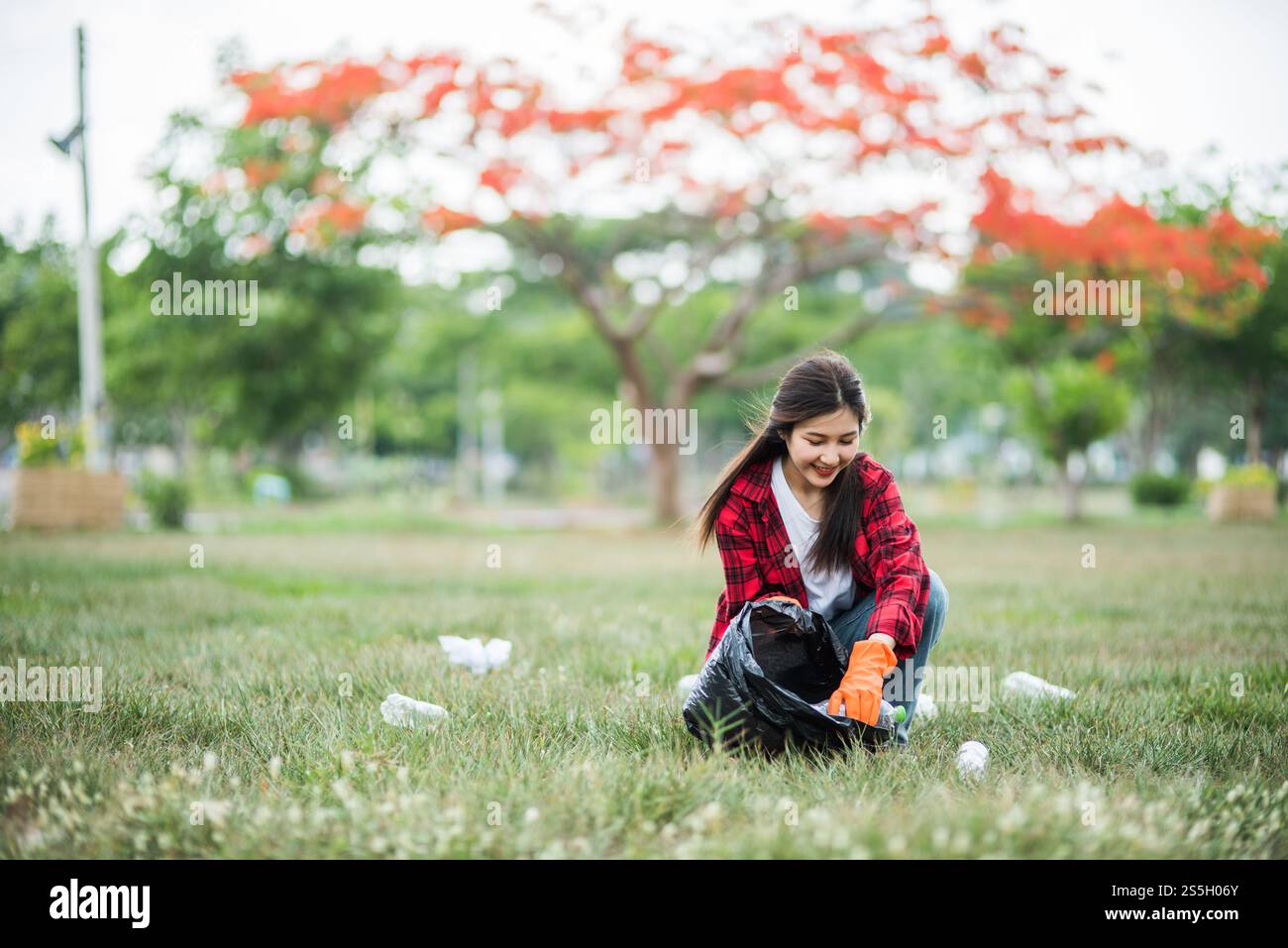 Black girl collecting plastic waste hi-res stock photography and images ...