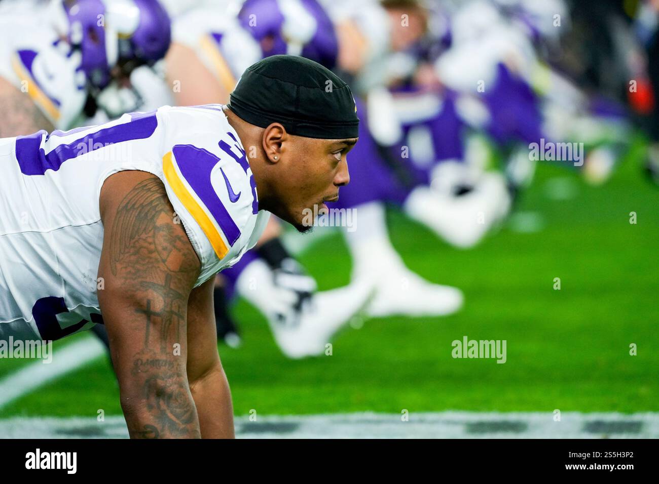 Minnesota Vikings fullback C.J. Ham (30) stretches before an NFL ...