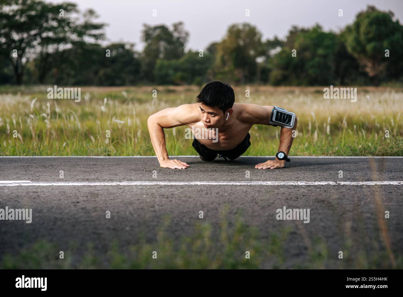The men who removed the shirts had muscles push up the streets Stock ...