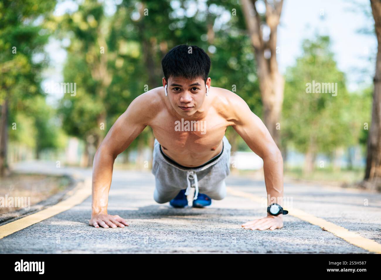 The men who removed the shirts had muscles push up the streets Stock ...