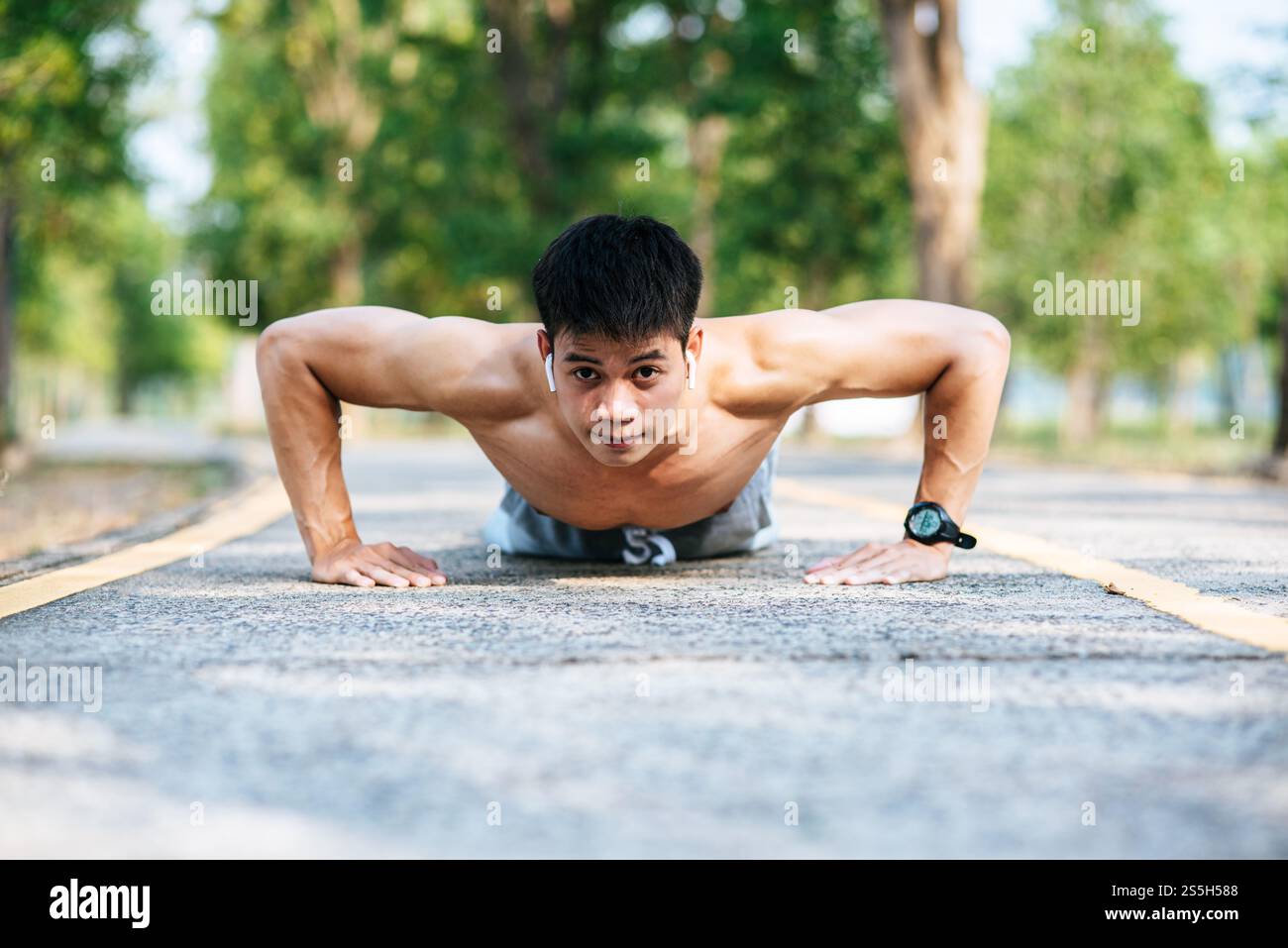 The men who removed the shirts had muscles push up the streets Stock ...
