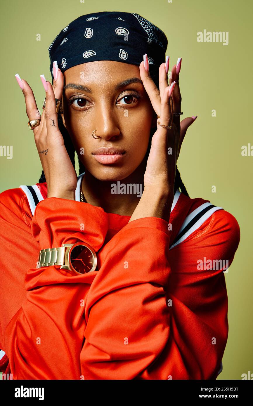 A confident young woman poses, showcasing her expressive style and bold ...