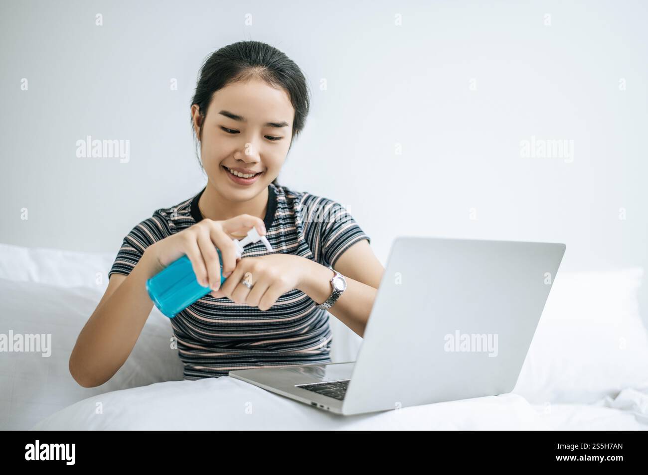 Hand young woman applying hi-res stock photography and images - Alamy