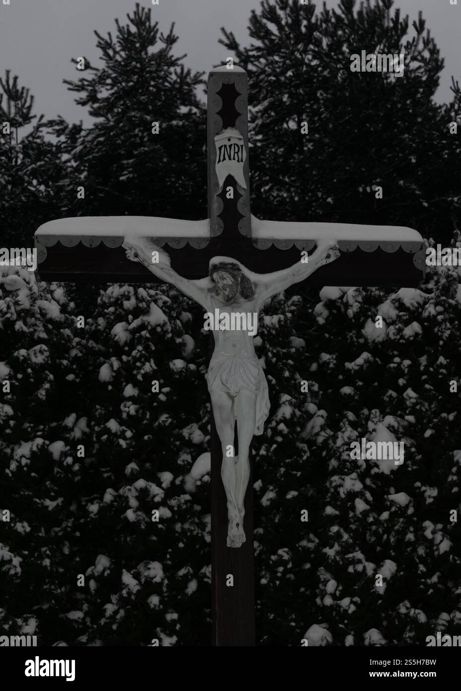 Snow-covered Jesus Christ crucifix with INRI sign Stock Photo - Alamy
