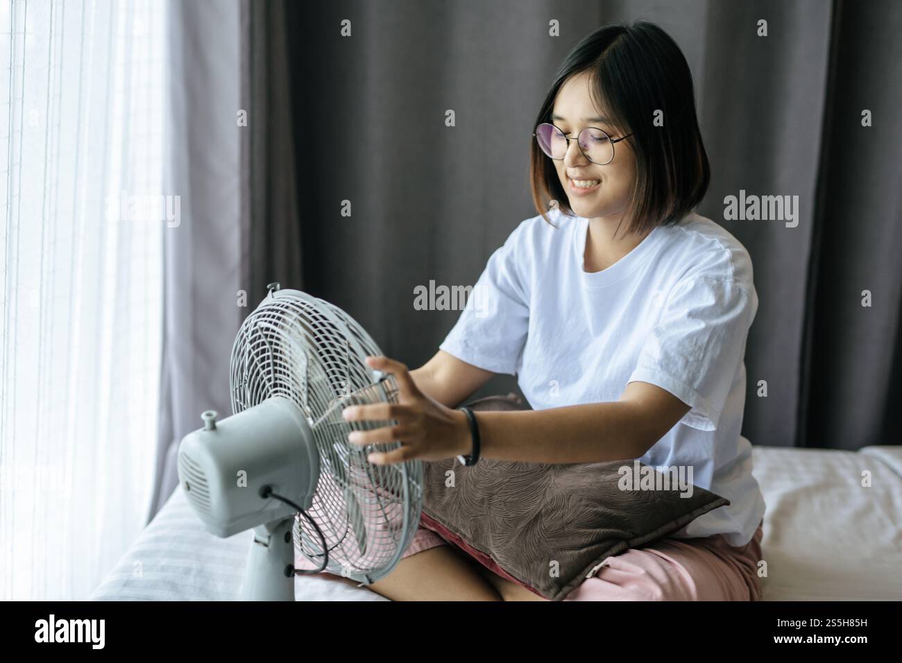 Woman wearing hand white hi-res stock photography and images - Alamy