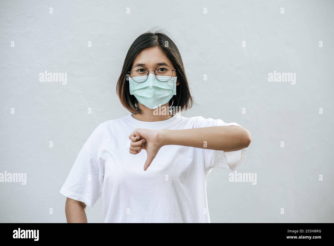 Woman wearing protection mask hi-res stock photography and images - Alamy