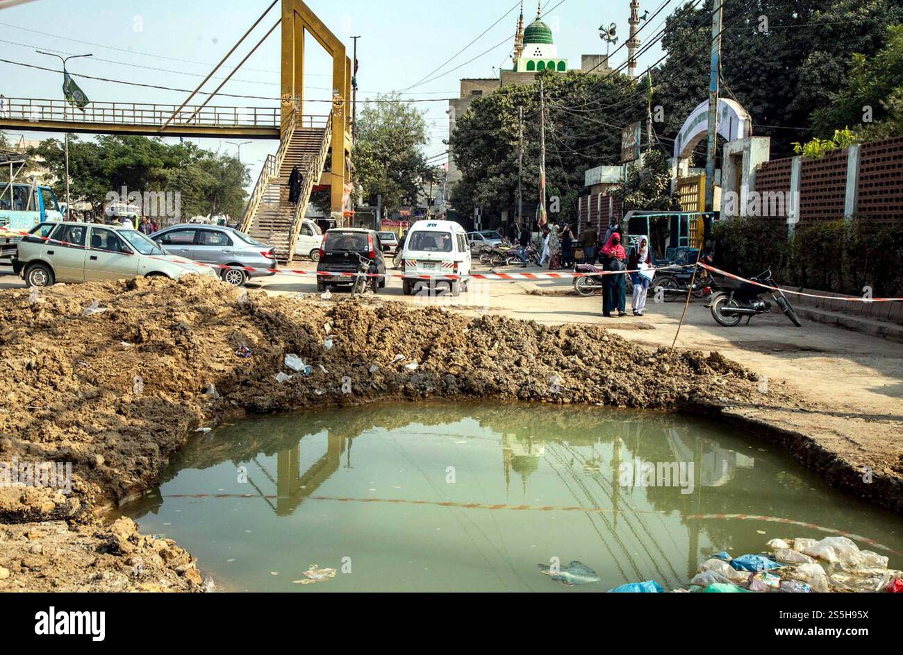 View of pit dug full of water, showing the negligence of concerned ...