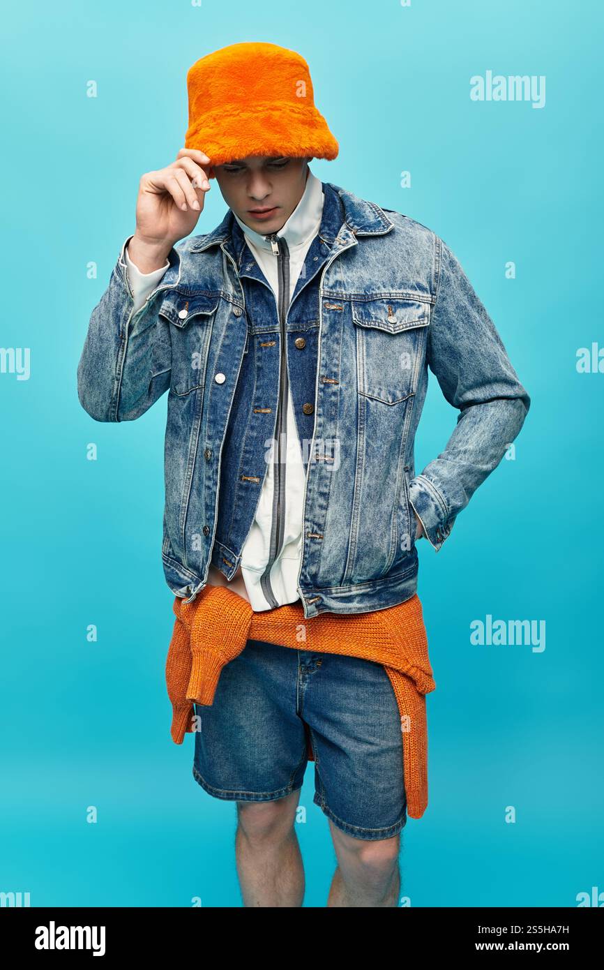 A handsome young man poses confidently, featuring a lively outfit and a ...