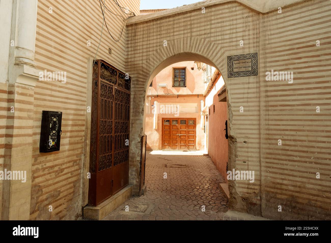 Moorish arch in the alleys of the Marrakech Medina streets of Morocco ...