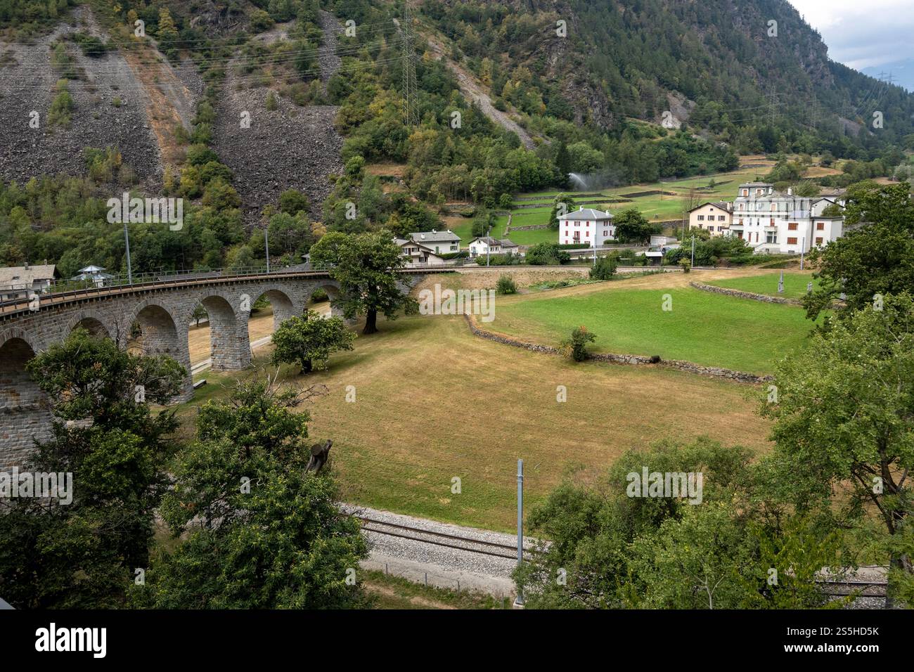 Brusio spiral railway viaduct in Switzerland Stock Photo - Alamy