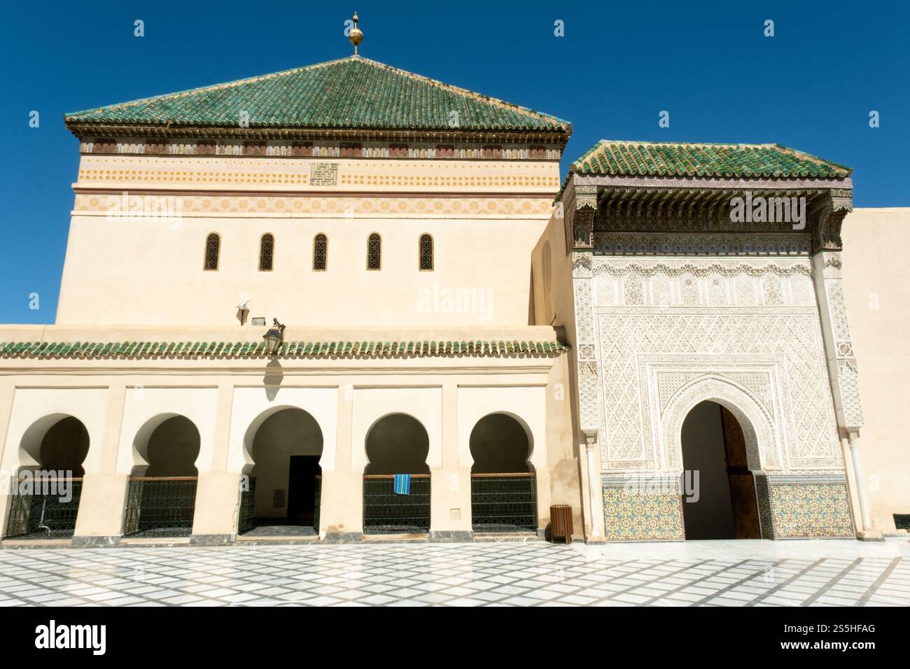 A mosque with arabic architecture and moorish arches at a plaza in ...