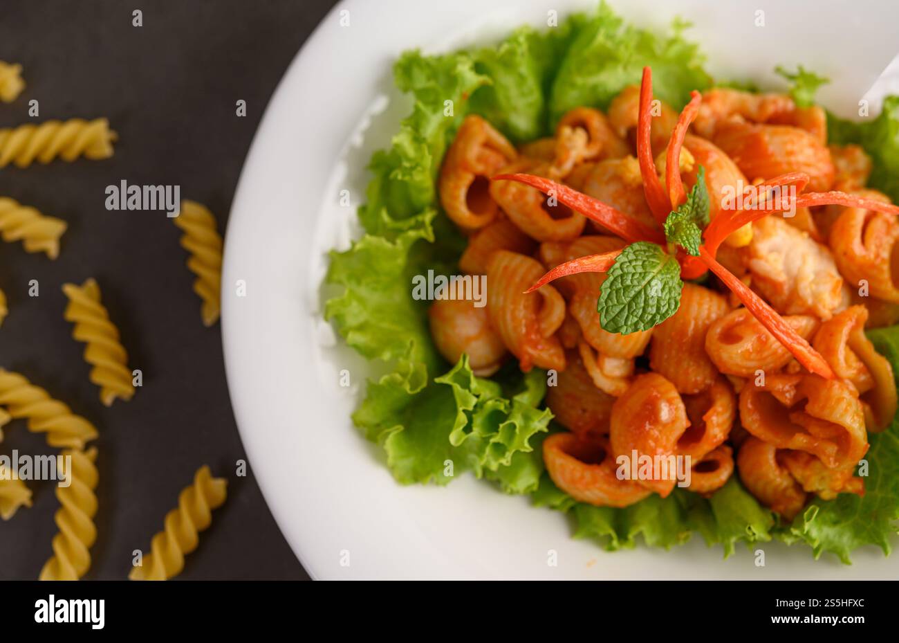 The pipe rigate italian pasta with tomato sauce and egg hi-res stock ...