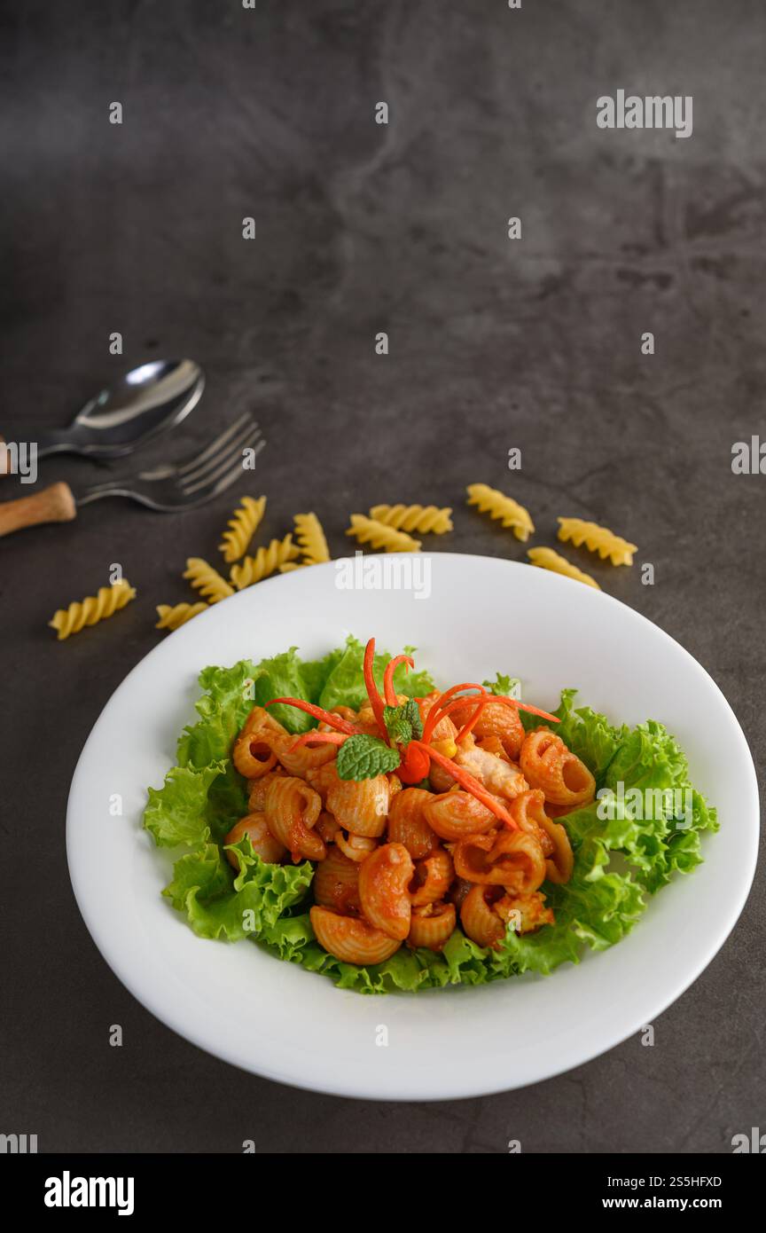 The pipe rigate italian pasta with tomato sauce and egg hi-res stock ...